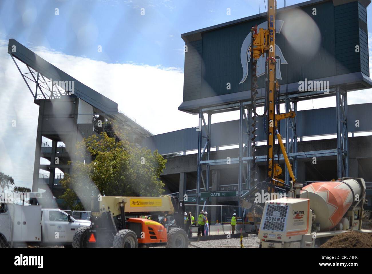Construction crews look over the outside of Spartan Stadium on Aug. 8 ...