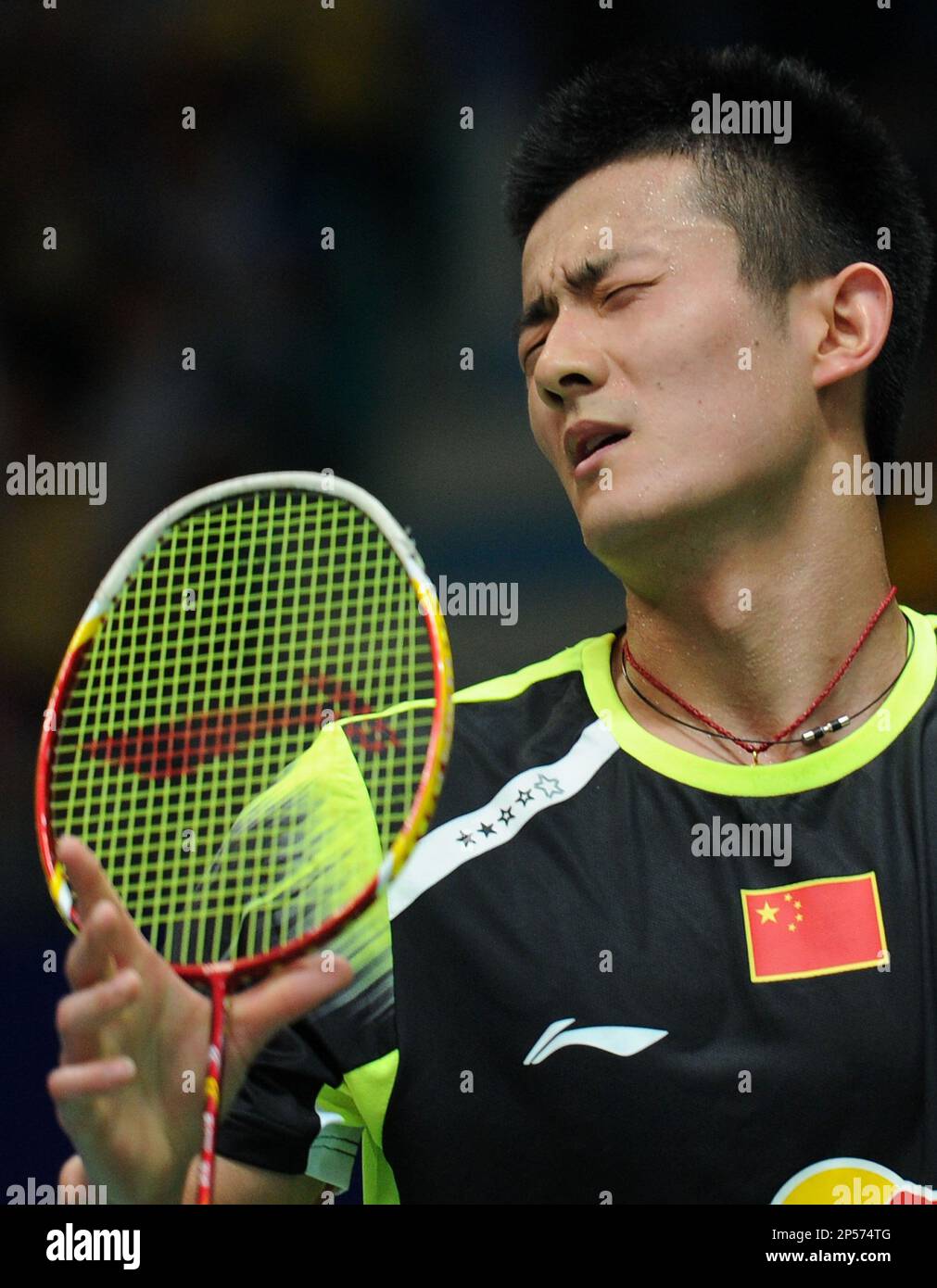 Chinese badminton player Chen Long reacts during a men's singles ...