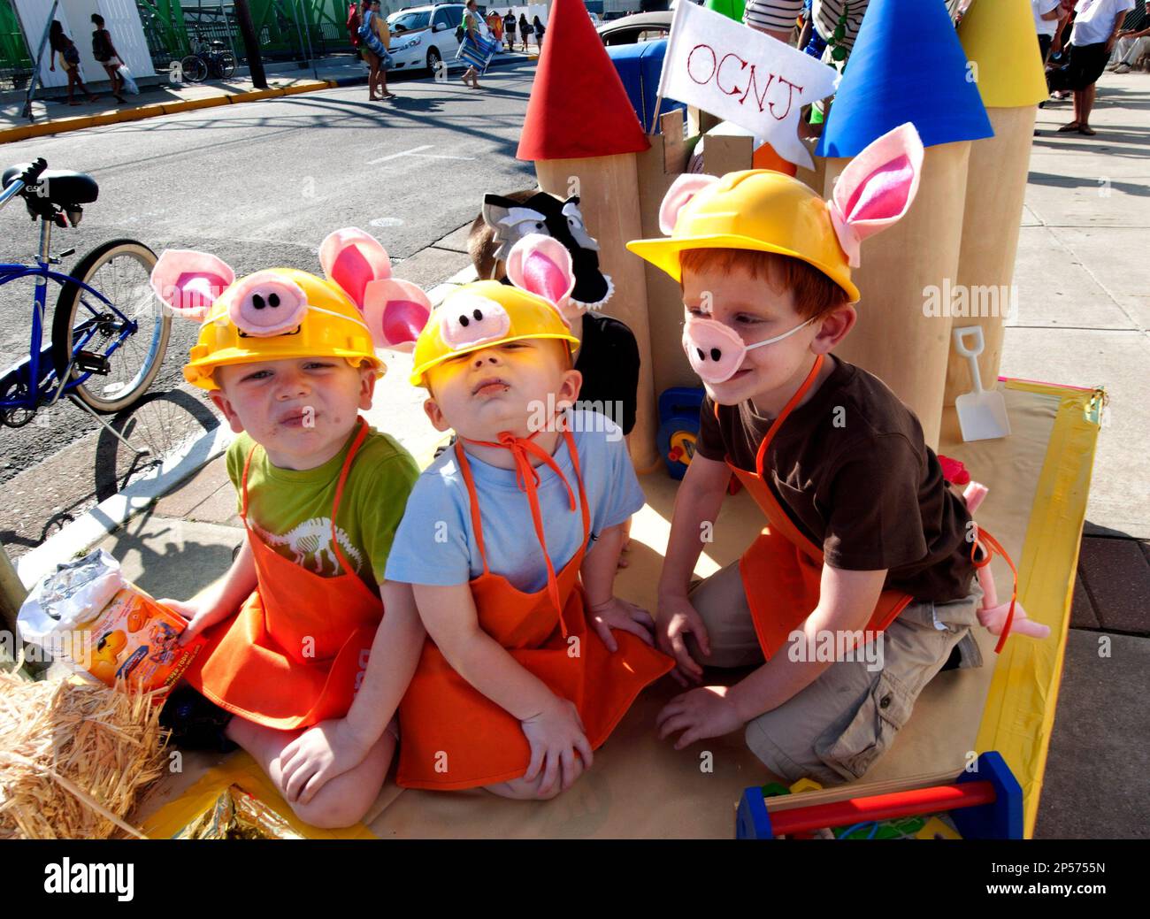 Portraying the Three Little Pigs, from left, are Brian Dever, 4, Kevin ...