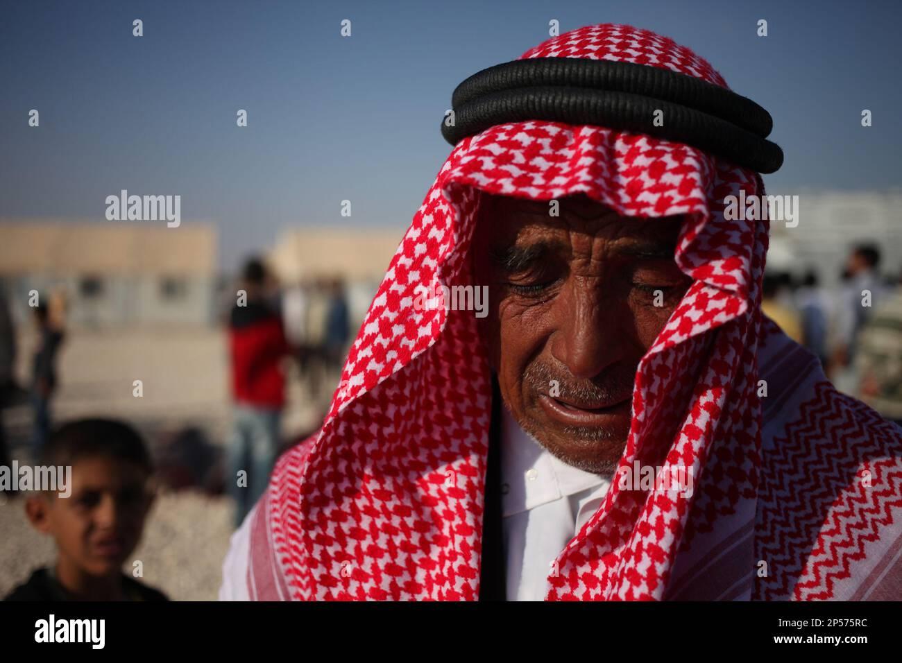 Syrian refugee, Ahmed al Delly, 59, from Daraa in Syria, reacts as he ...
