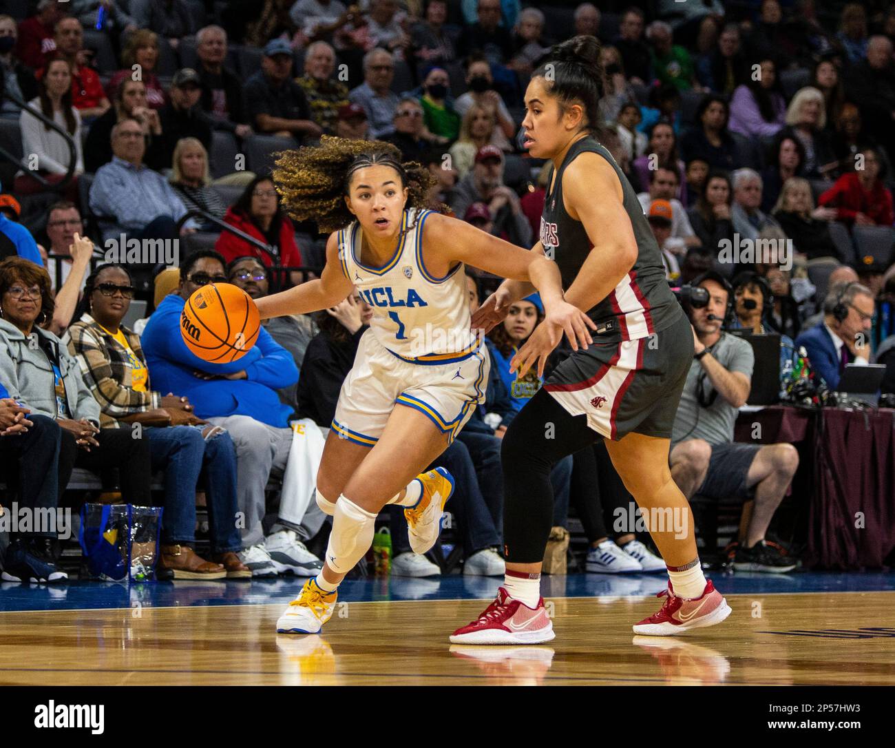 LasVegas, NV, USA. 05th Mar, 2023. A. UCLA guard Kiki Rice (1)drives to ...