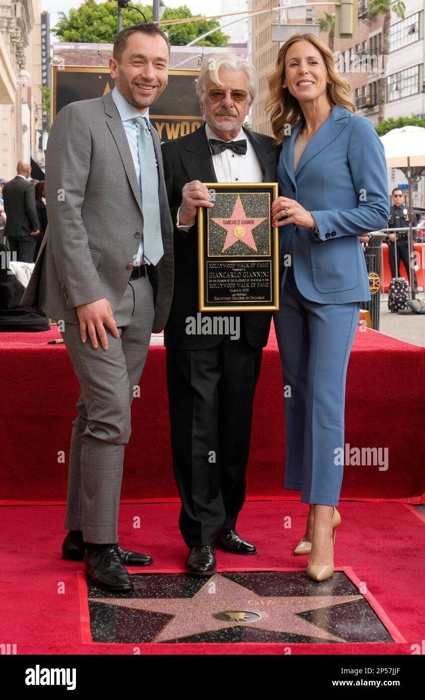 Emanuele Amendola, left, and Raffaella Valentini, right, pose with ...