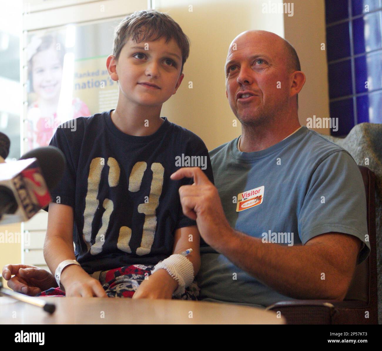 Kim Hancock and his son, Cole Hancock, talked with the media at OHSU ...