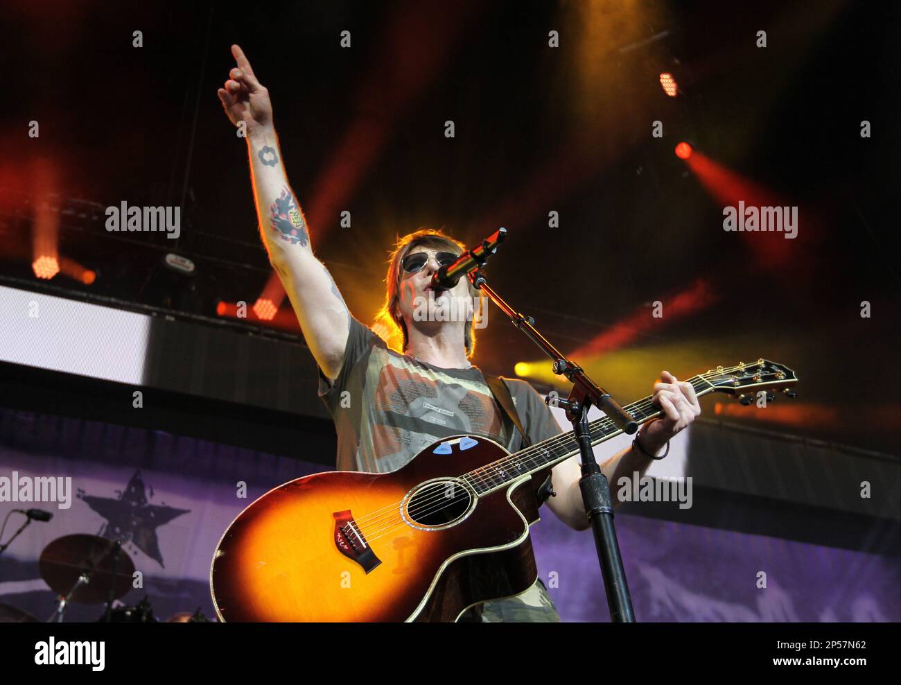 The Goo Goo Dolls lead singer Johnny Rzeznik performs during a concert ...