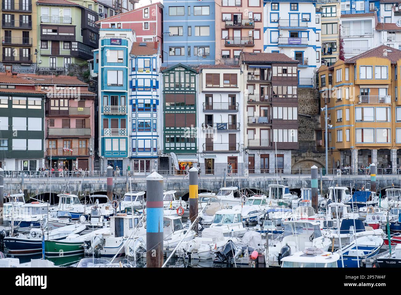 Spain Basque Provinces Bermeo harbour port village boats houses homes ...