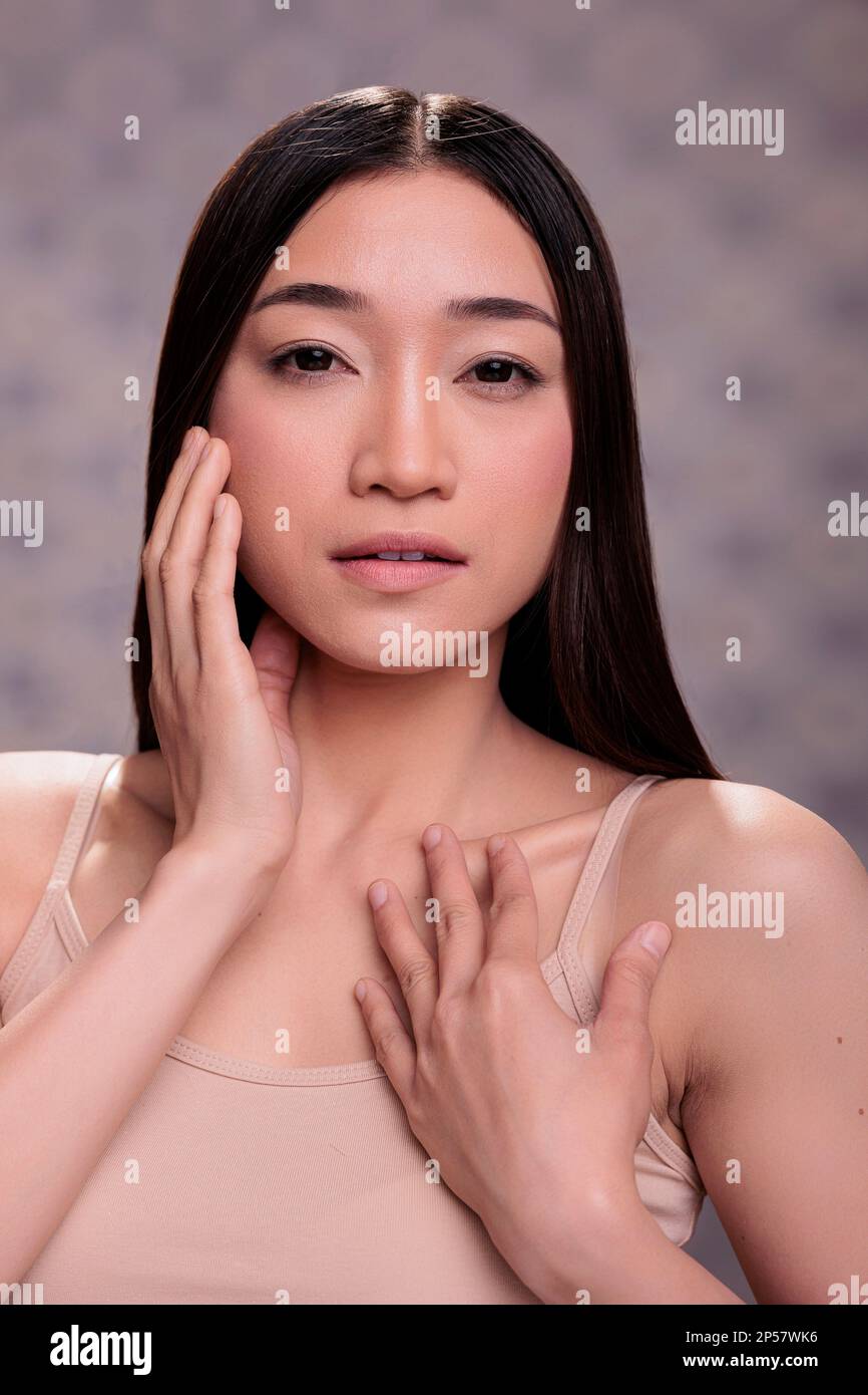 Young natural beautiful asian model posing for cosmetology fashionable ...