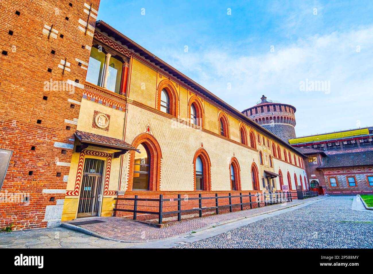 Medieval buildings with frescoes on facade adjoined to the walls in ...