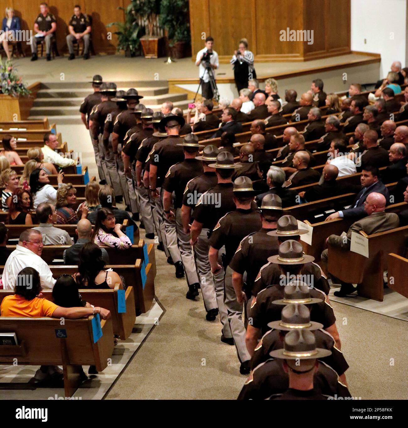 Members of the Oklahoma Highway Patrol graduating class march to their ...