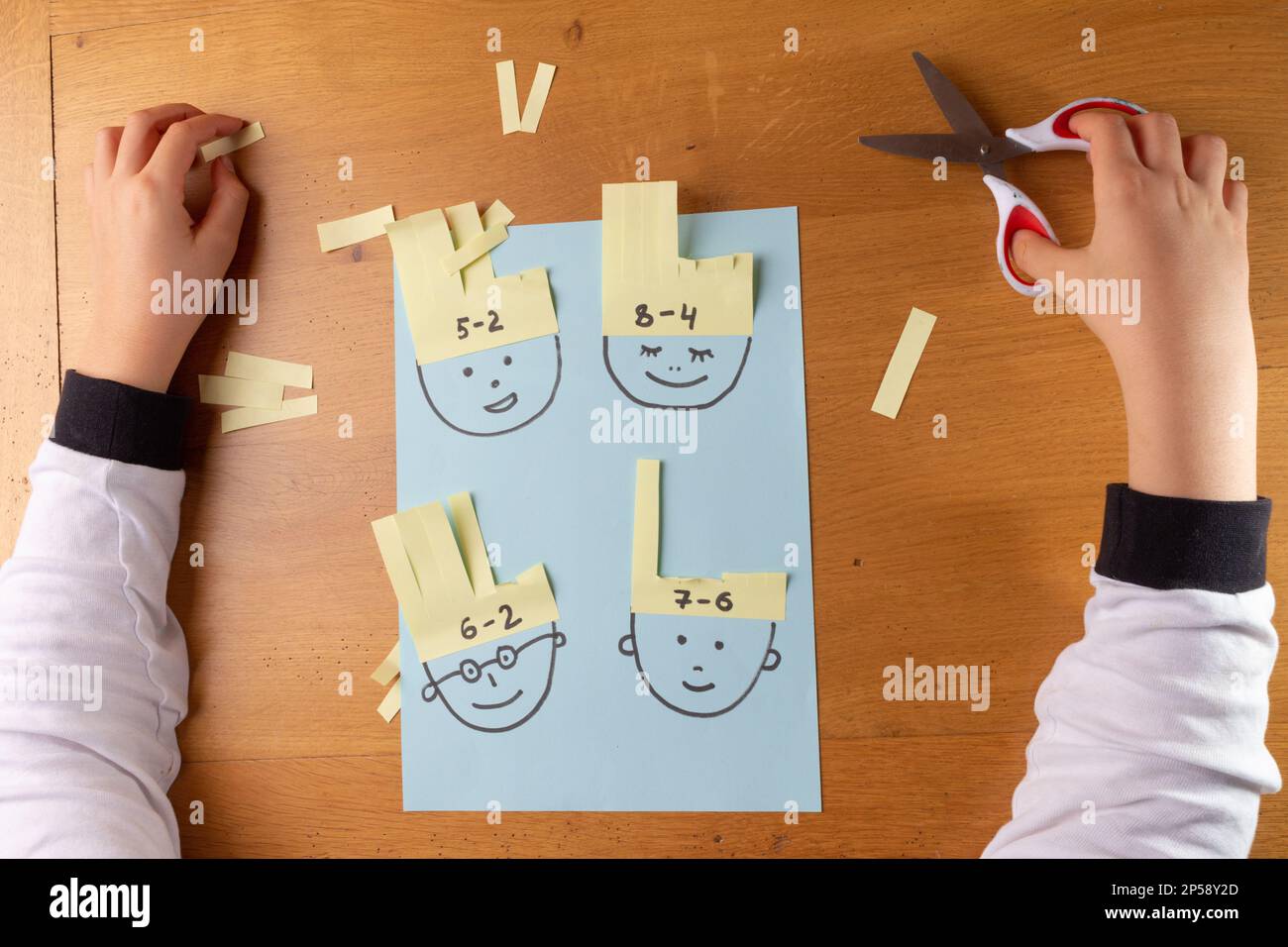 preschooler mathematics activity, kids hands cut paper with ...