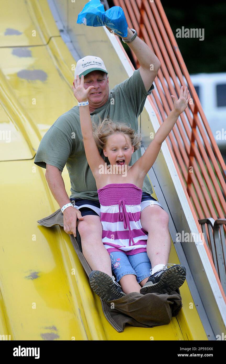 Robert Withrow and his daughter Bailey Withrow come down the super ...