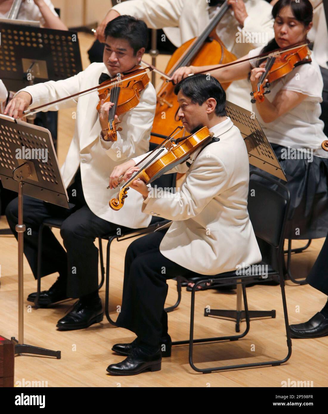 Japanese Crown Prince Naruhito, center, plays the viola during a ...