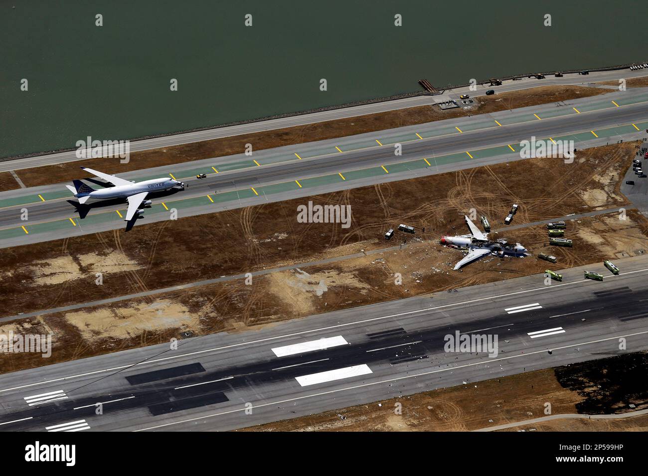 This aerial photo shows the crash site of Asiana Flight 214 at the San ...