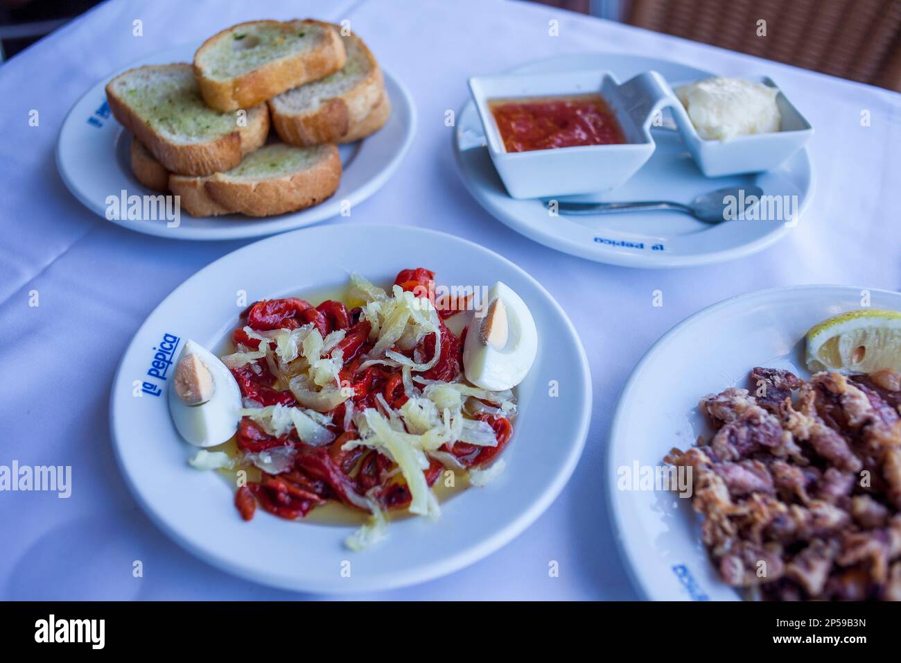 Esgarrat (peppers and salted cod),small octopus,bread and dips. In La ...