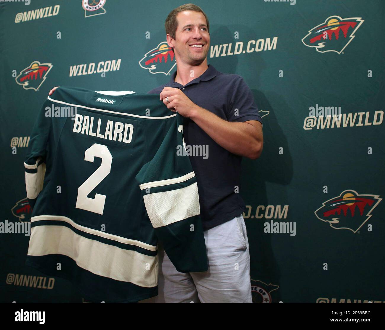 Minnesota Wild defenseman Keith Ballard shows off his new jersey after ...