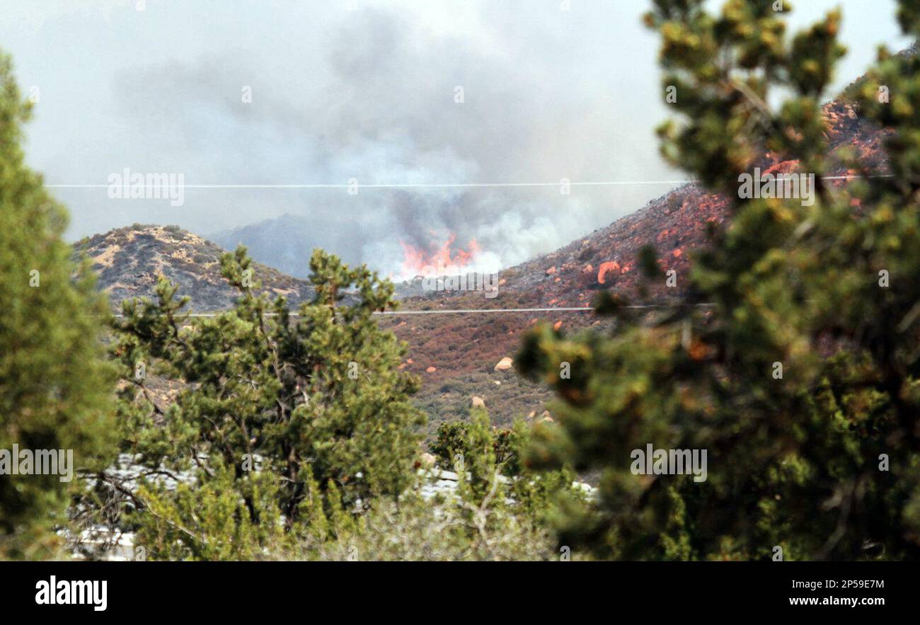 The Dean Peak Fire continues to burn near Kingman, Ariz., on Wednesday ...