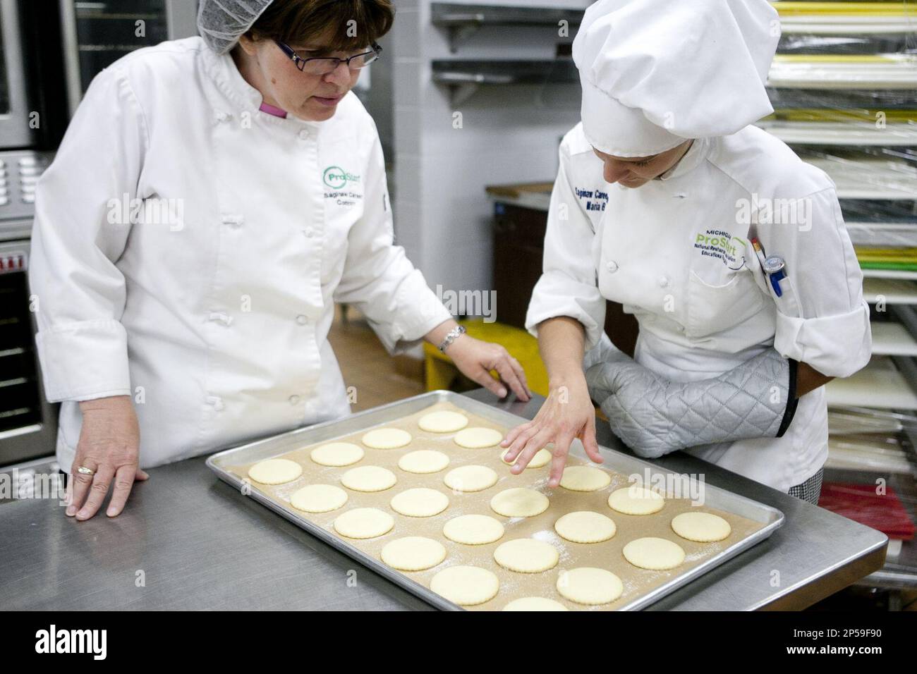 Julie Ivan, a culinary instructor at the Saginaw Career Complex, checks ...