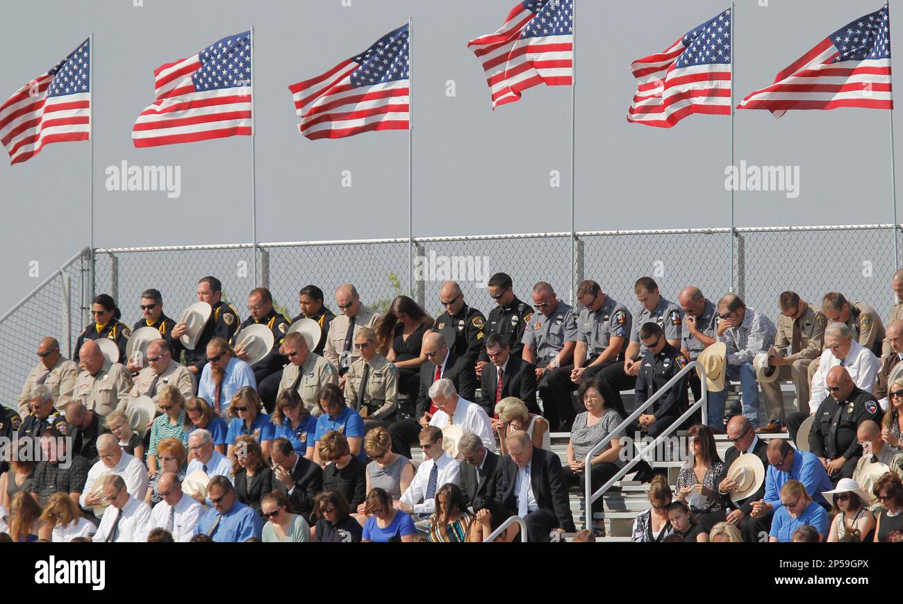 A large number of officers from around the state attend the funeral for ...