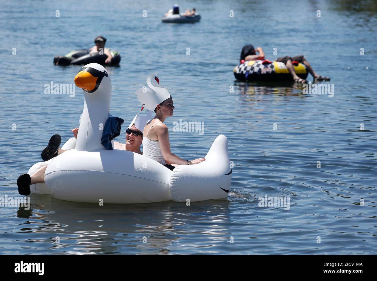 Kurt Segrist and niece Erin Coleman-Hicks, both of Bend, Ore., float ...