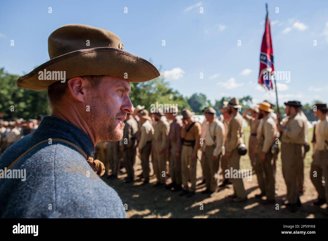 Skip Owen, portraying a Confederate lieutenant colonel, drills his ...