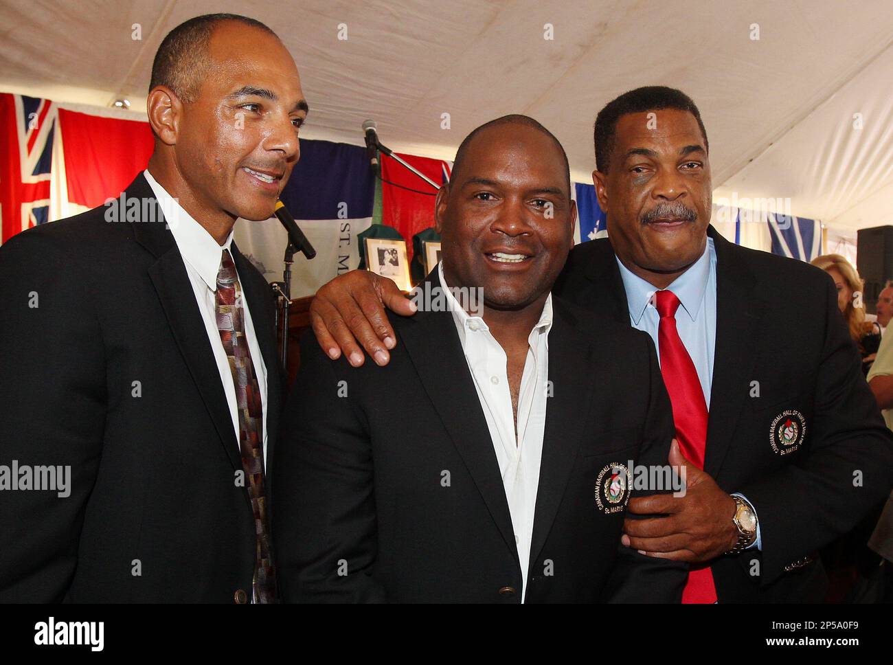From left, Rob Ducey, Tim Raines and George Bell congratulate each ...