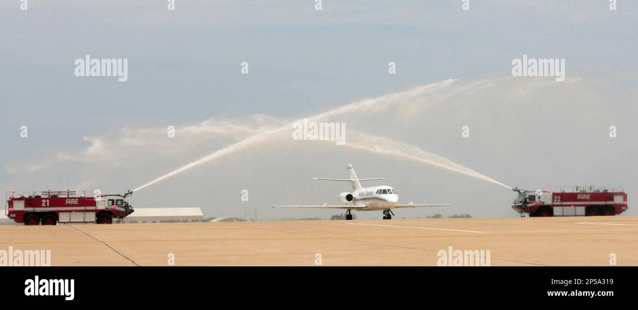 Family and friends watch as the plane carrying Spc. Ember Alt arrives ...