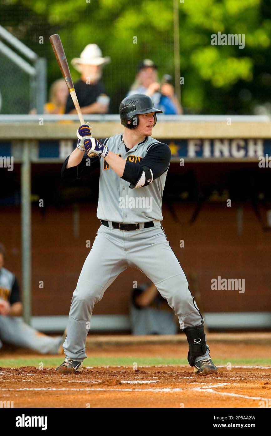 Luke Lowery #10 (East Carolina) of the Wilson Tobs at bat against the ...