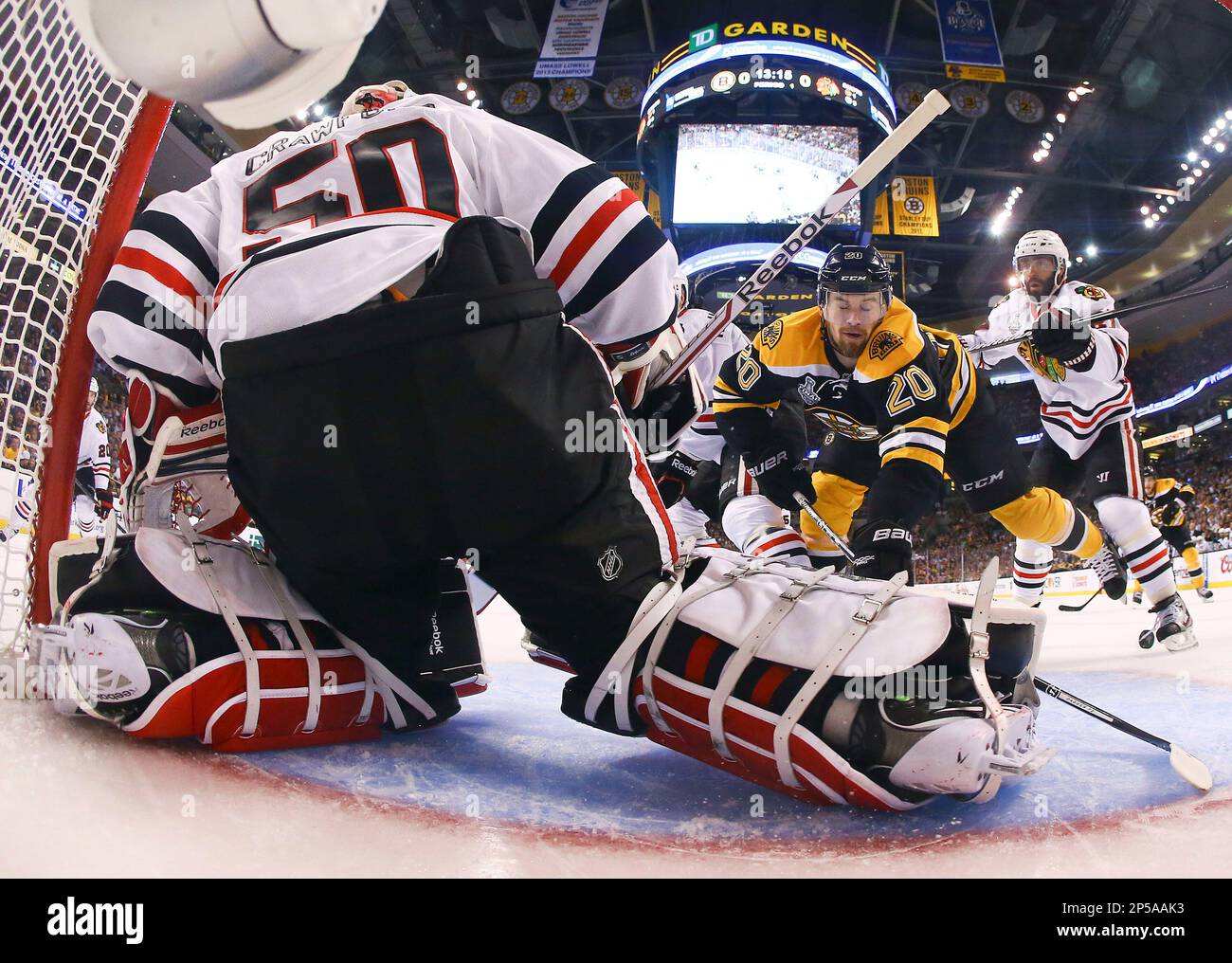 Chicago Blackhawks defenseman Johnny Oduya, right, of Sweden, knocks ...