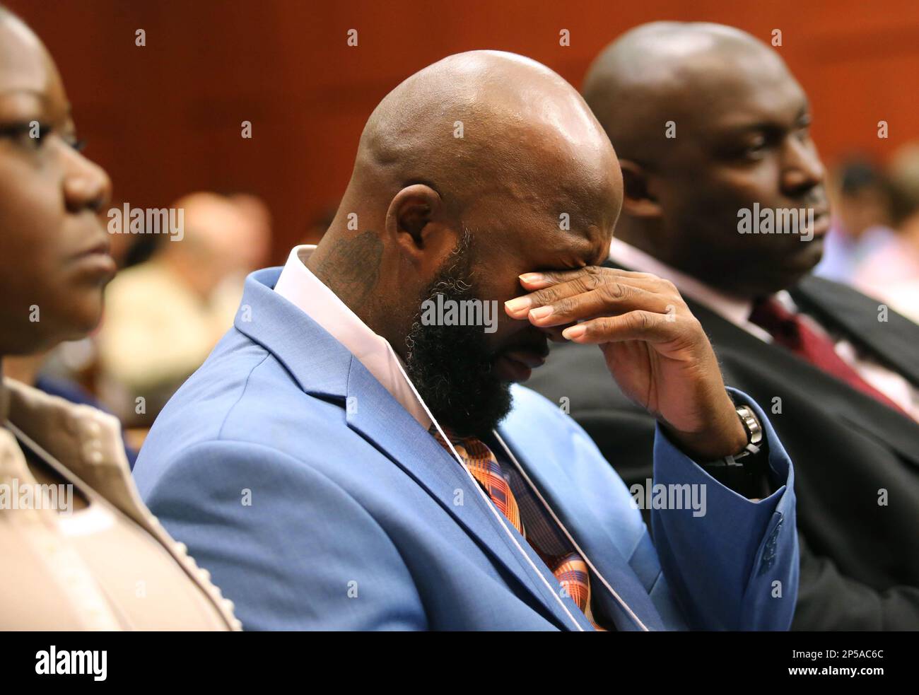 The father of Trayvon Martin, Tracy Martin, cries as he listens to the ...
