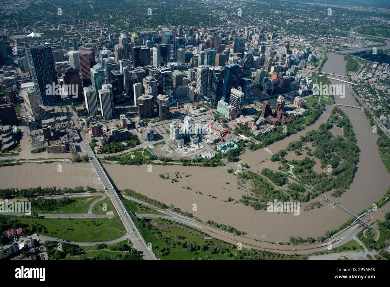This aerial photo shows downtown Calgary, Alberta, Canada flooded on ...