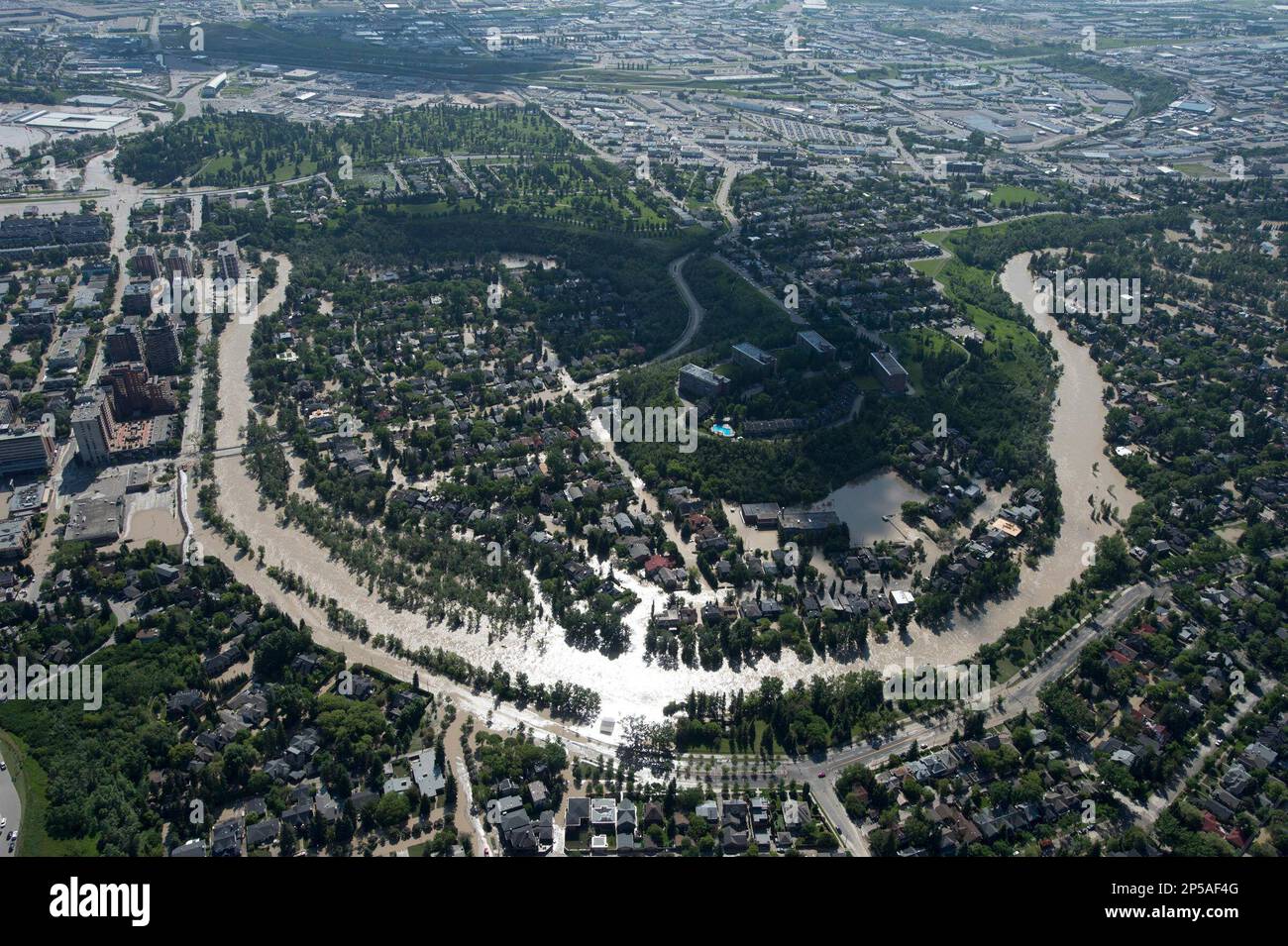 This aerial photo shows downtown Calgary, Alberta, Canada flooded on ...