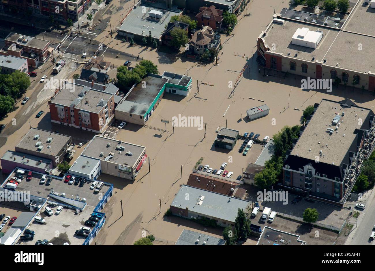 This aerial photo shows downtown Calgary, Alberta, Canada flooded on ...
