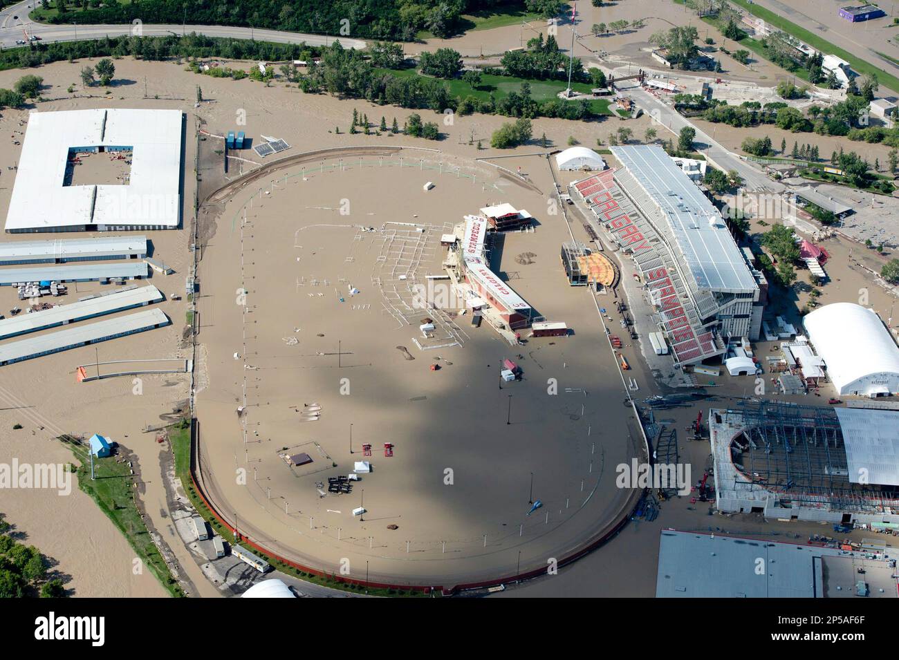 This aerial photo shows a flooded Calgary Stampede stadium in Calgary ...