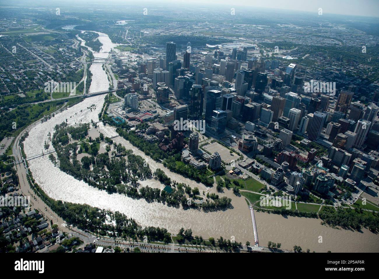 This aerial photo shows downtown Calgary, Alberta, Canada flooded on ...