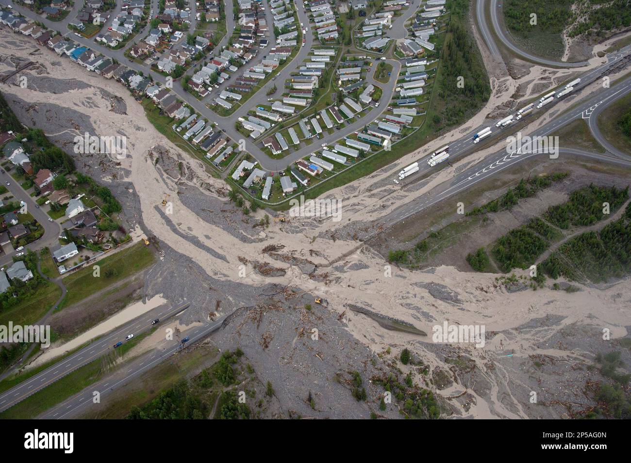 This aerial photo shows Cougar Creek runing through the Trans Canada ...