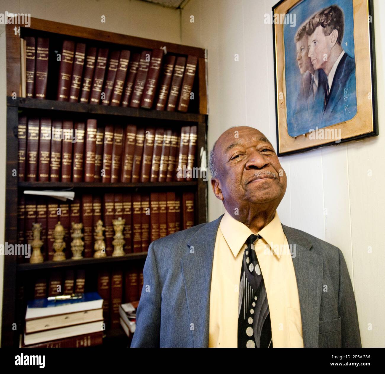 C. Frederick Robinson holds his head up proudly in his law office in ...