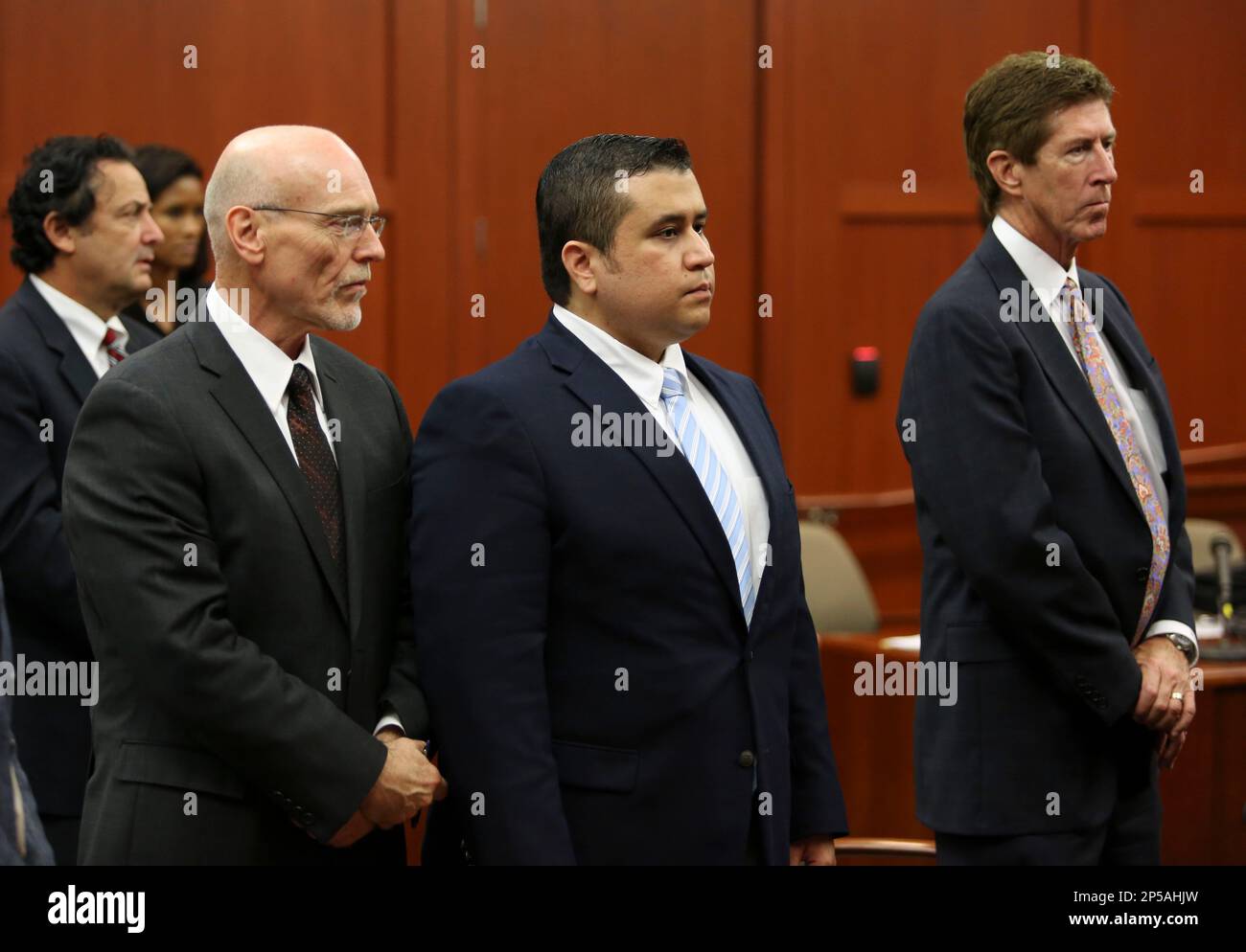 Co-counsel Don West, front left, and attorney Mark O'Mara, right ...