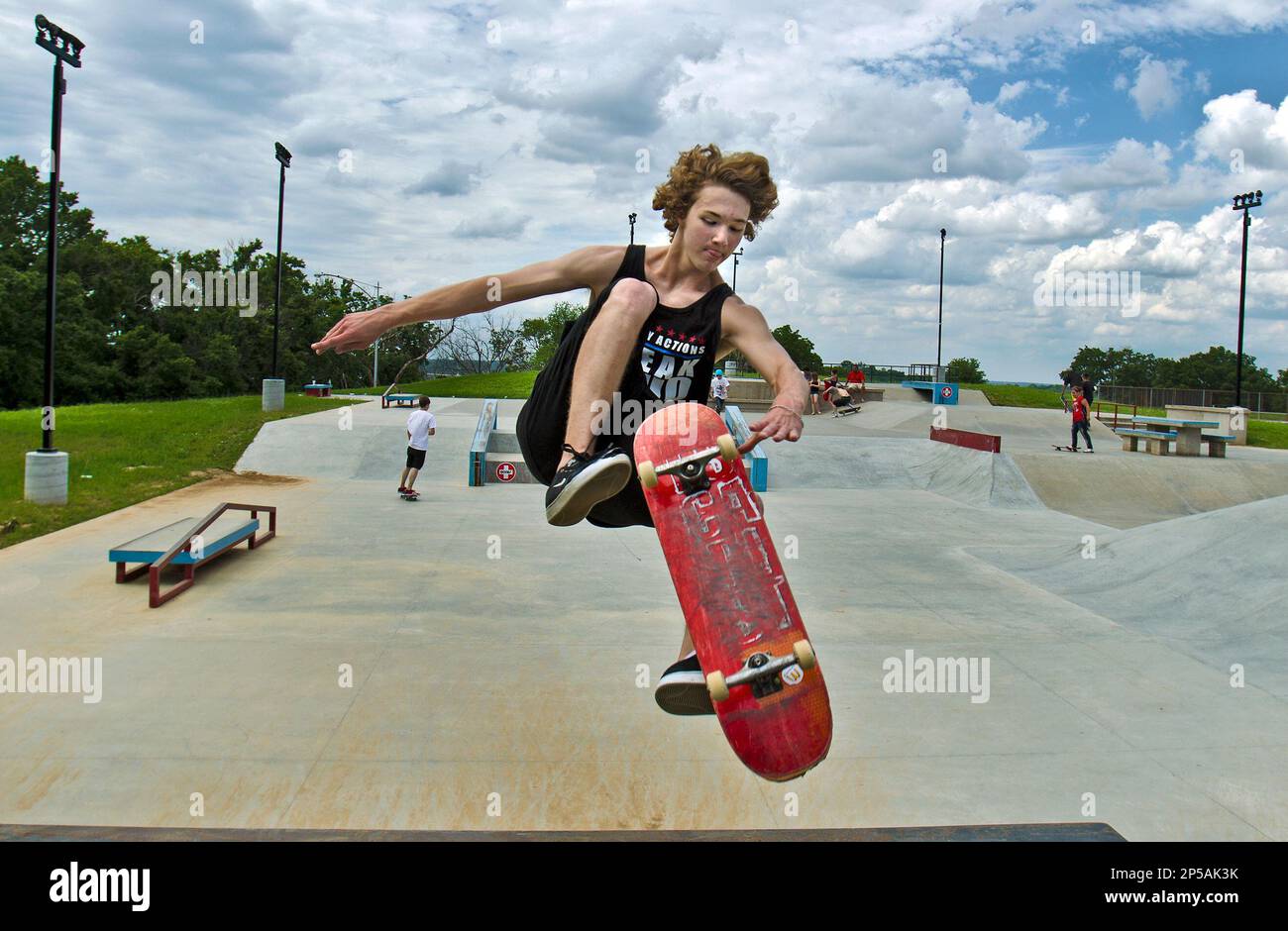 Isaac Stearns, 16, of Kansas City, performs a trick on Wednesday, June ...