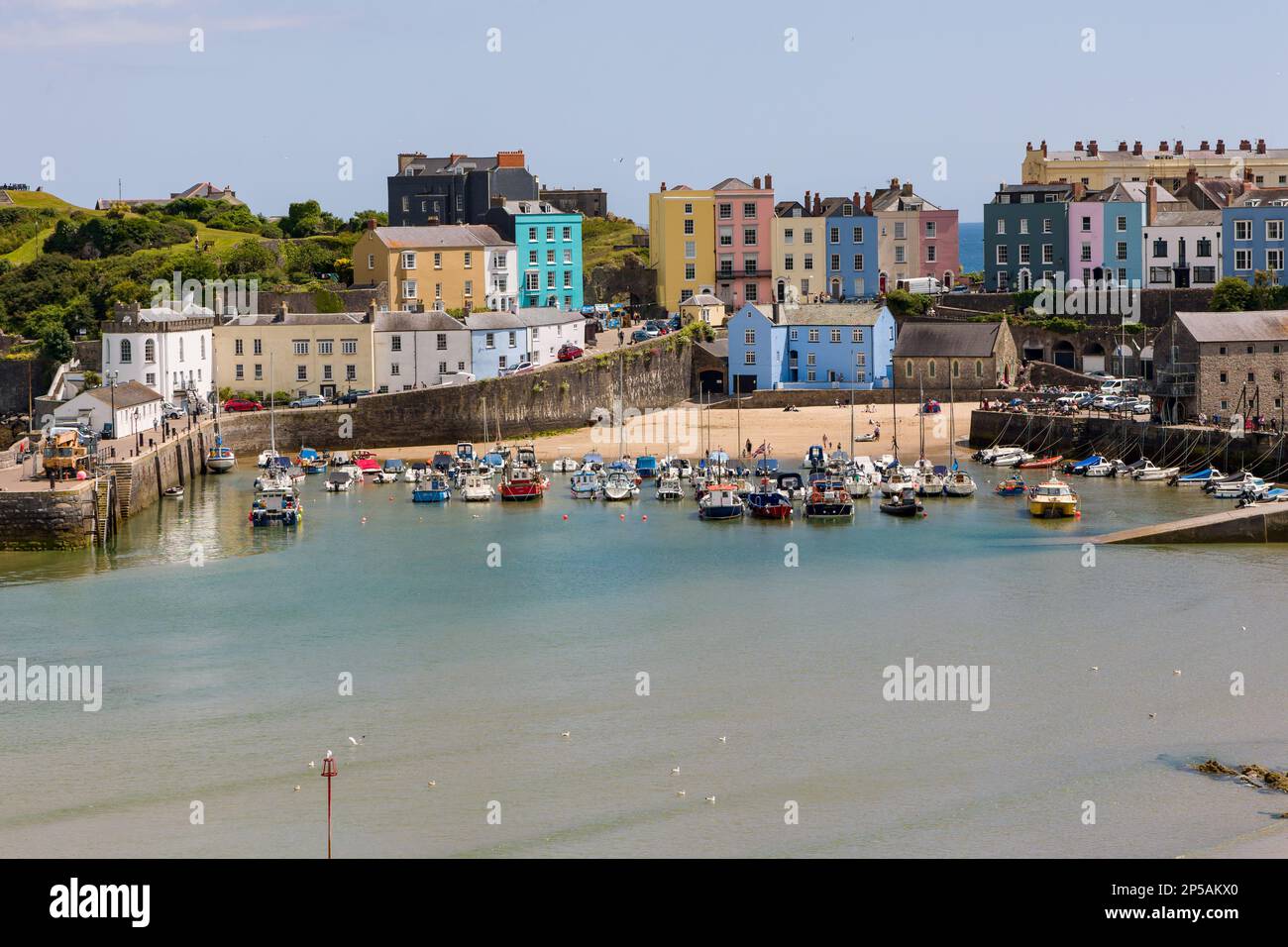 Colourful and picturesque buildings in the Welsh seaside town of Tenby ...