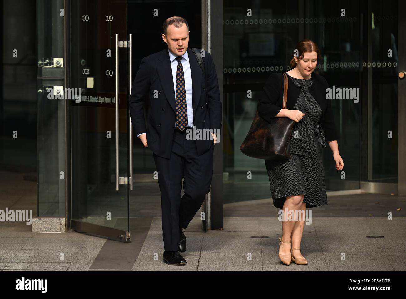 Barrister Matthew Minucci (left) representing Monique Ryan departs from ...