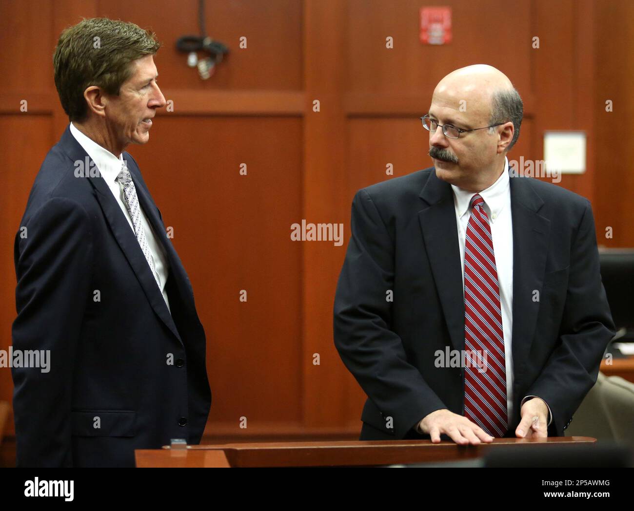 Defense attorney Mark O'Mara, left, and prosecutor Bernie de la Rionda ...