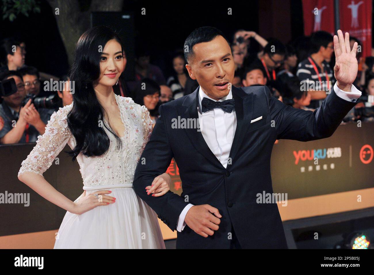 Hong Kong action actor Donnie Yan, right, poses for photographers with ...