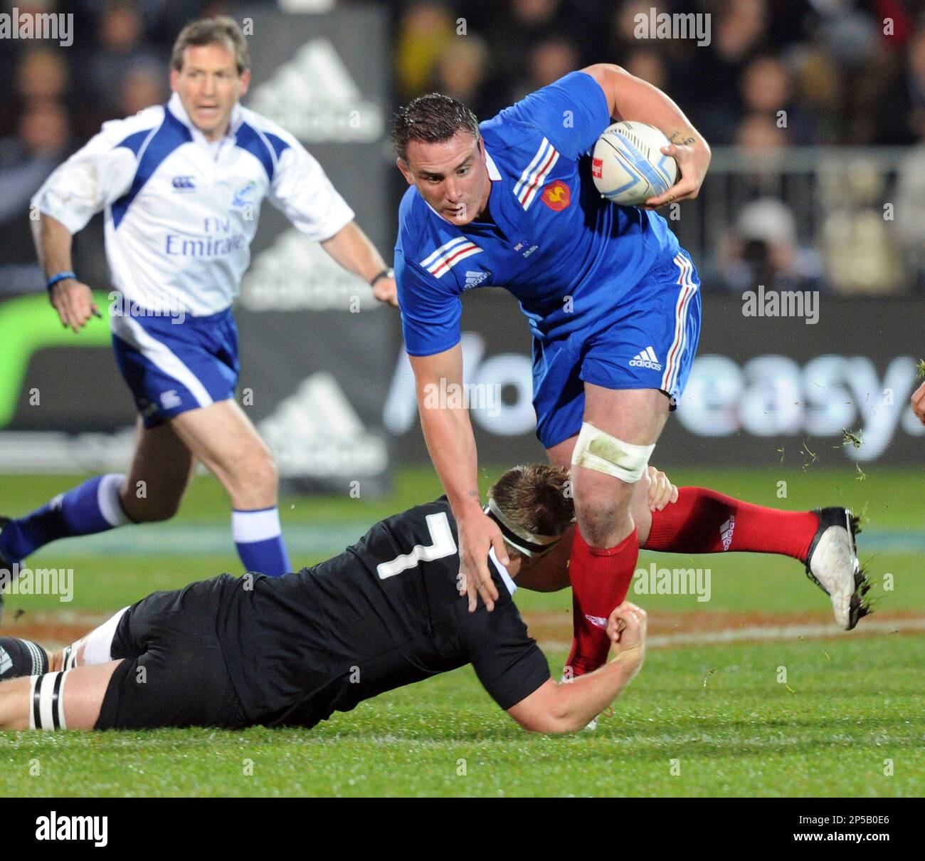 France's Louis Picamoles slips the tackle of New Zealand's Sam Cane in ...