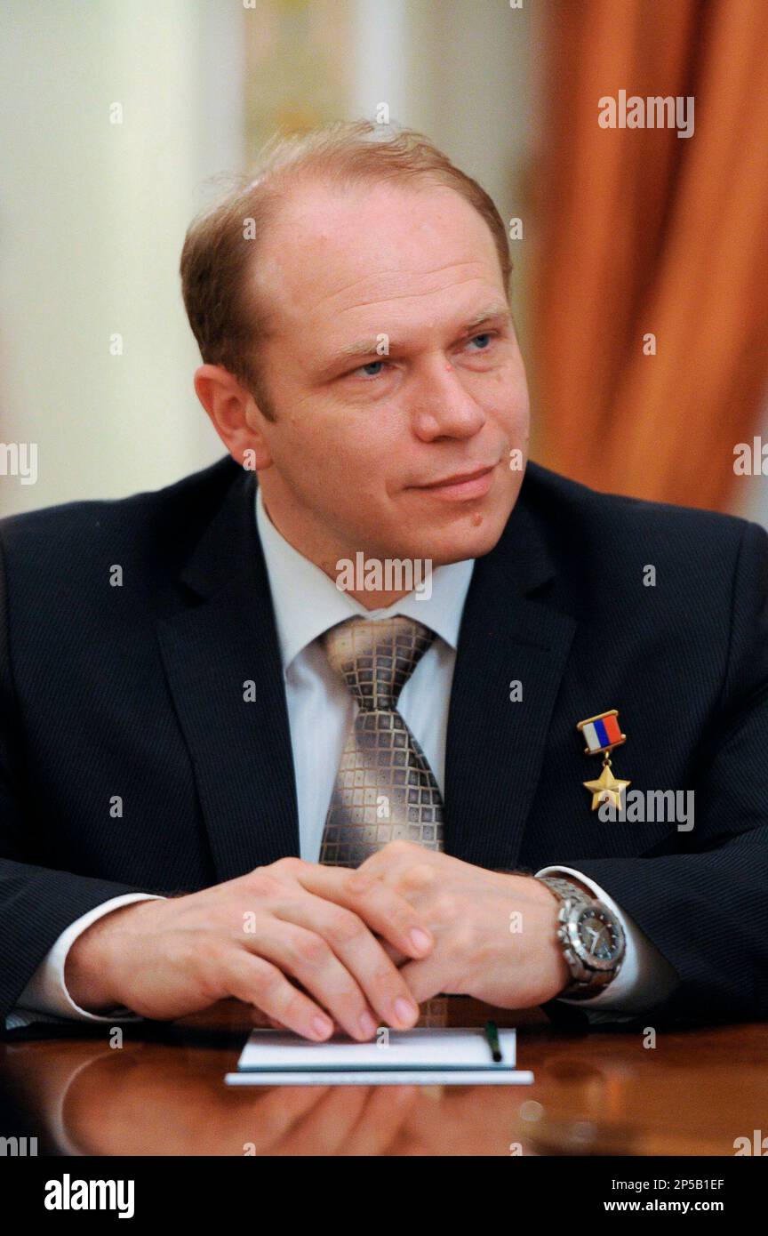 Russian cosmonaut Oleg Kotov attends a meeting with Russian President ...