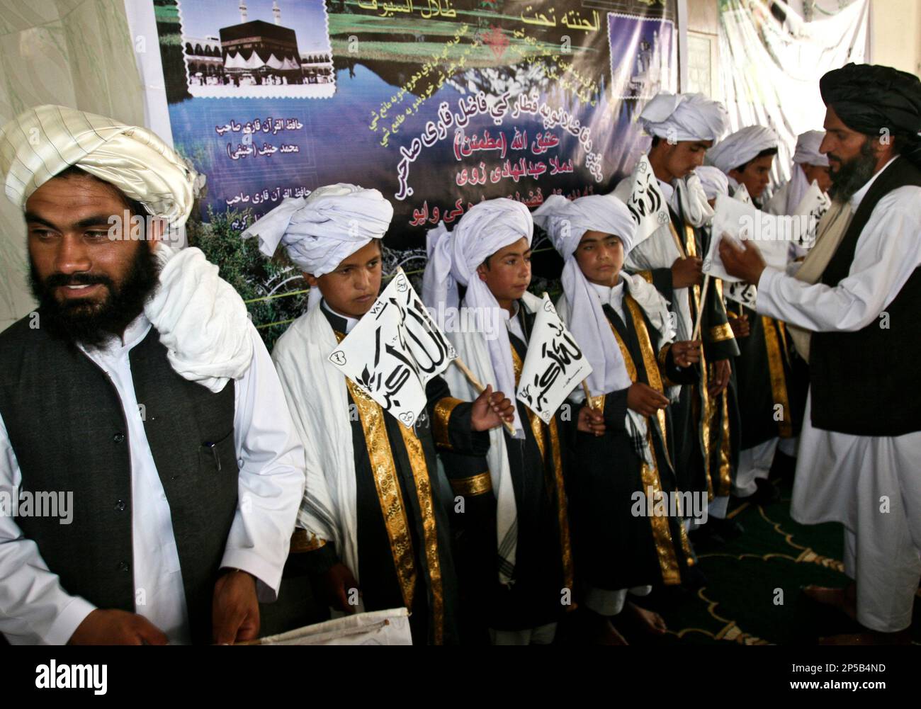 Afghan boys graduate from a local Islamic school or madrassa, during a ...
