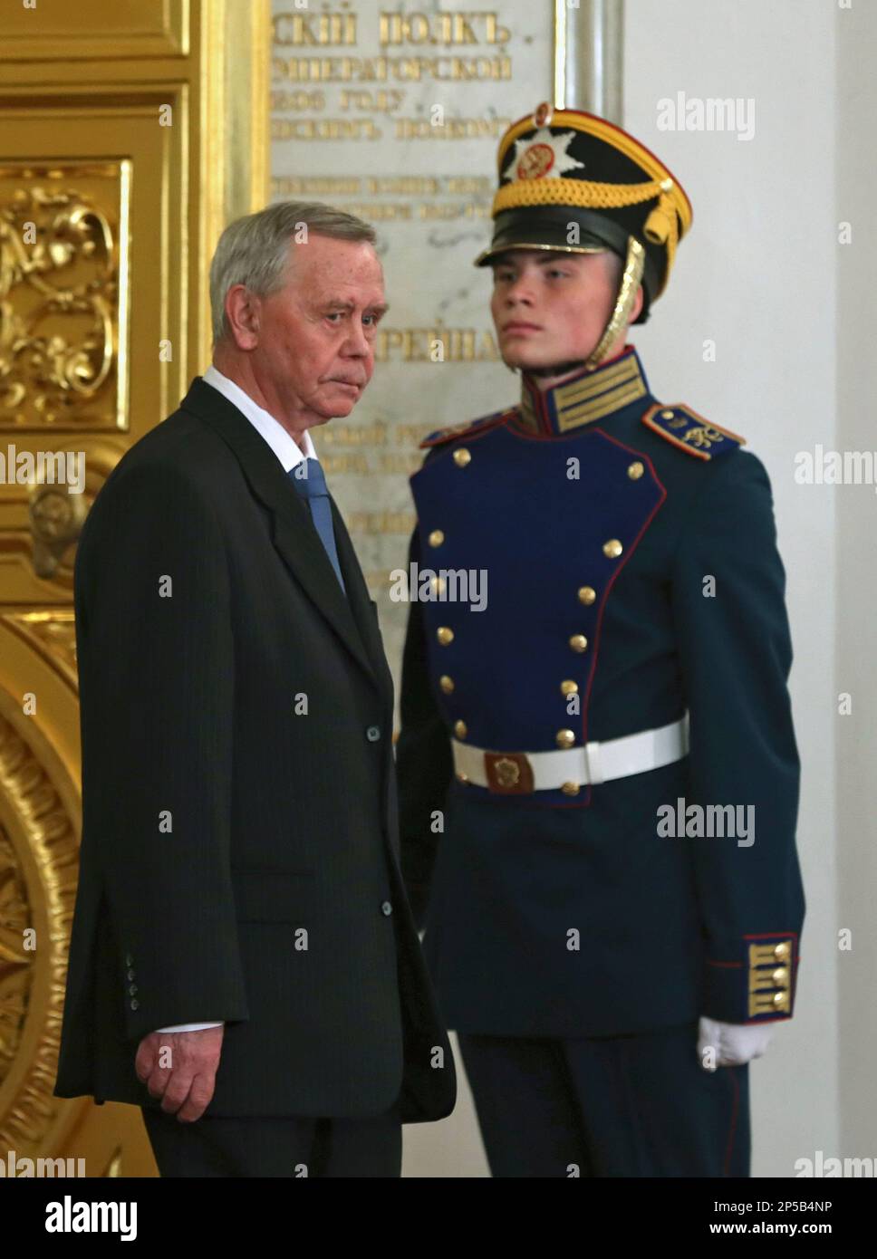 Russian writer Valentin Rasputin enters the St. George Hall to receive ...