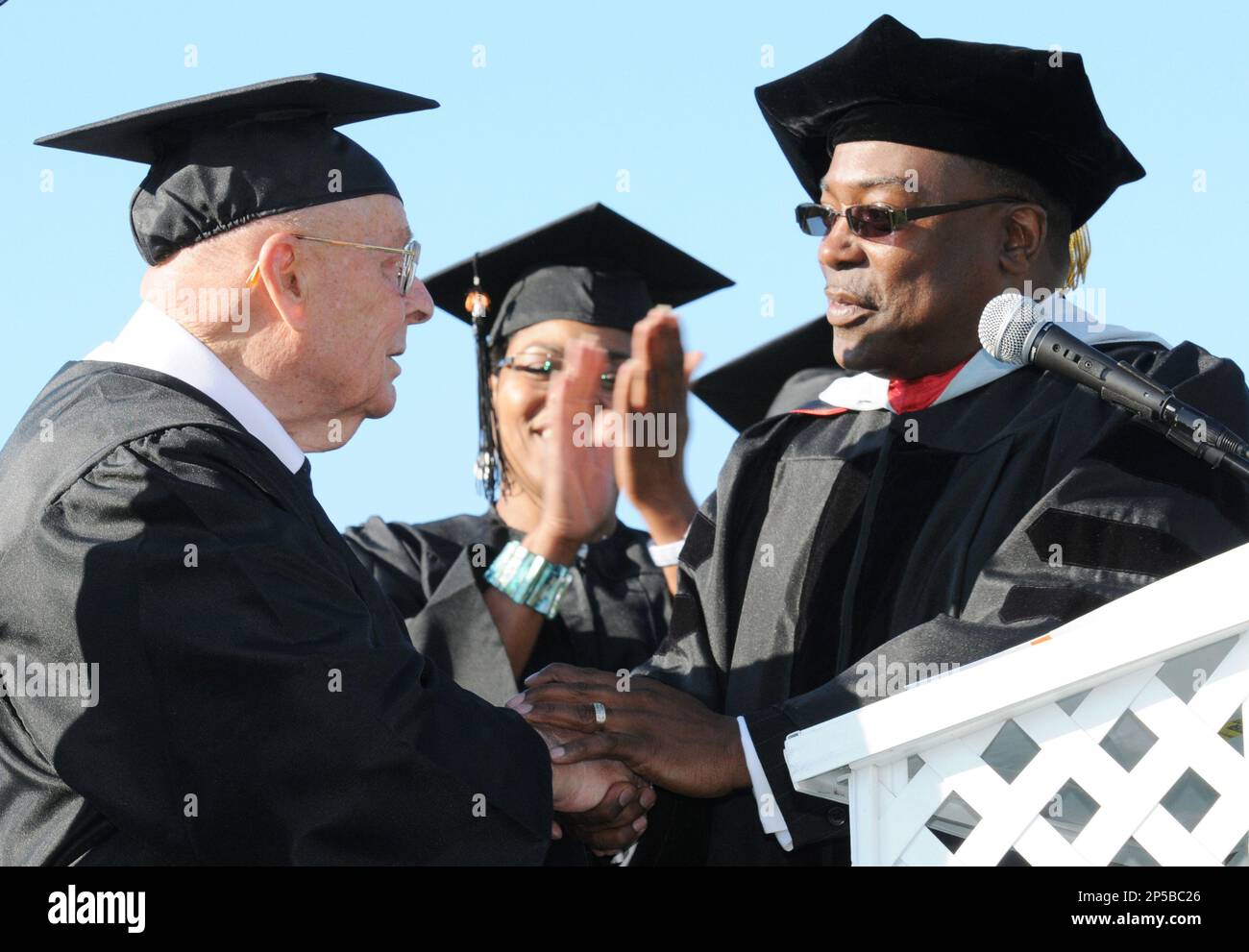 Dr. Leonard Seawood, right, Superintendent of Benton Harbor Area ...