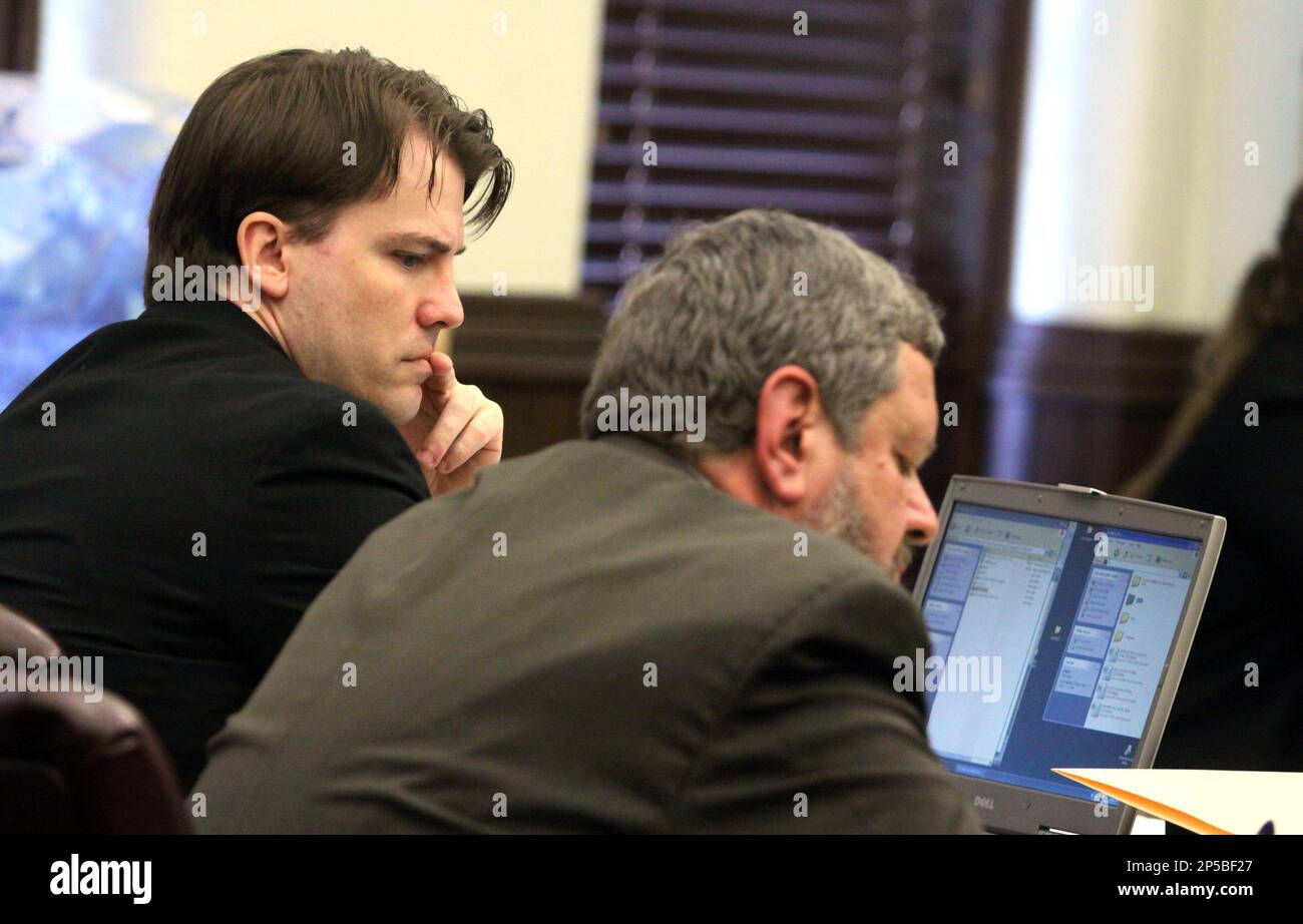 Brett Seacat sits beside his attorney Roger Falk during his trial ...