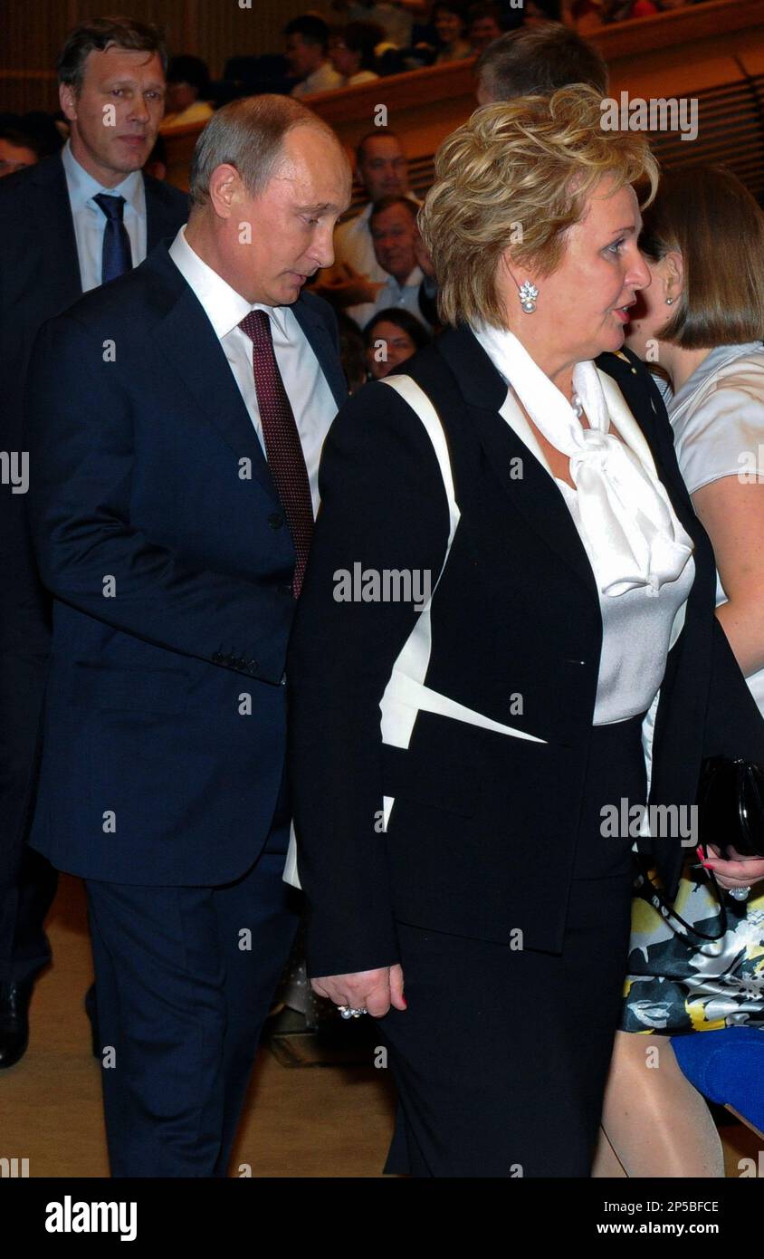 Russian President Vladimir Putin and his wife Lyudmila attend the ...