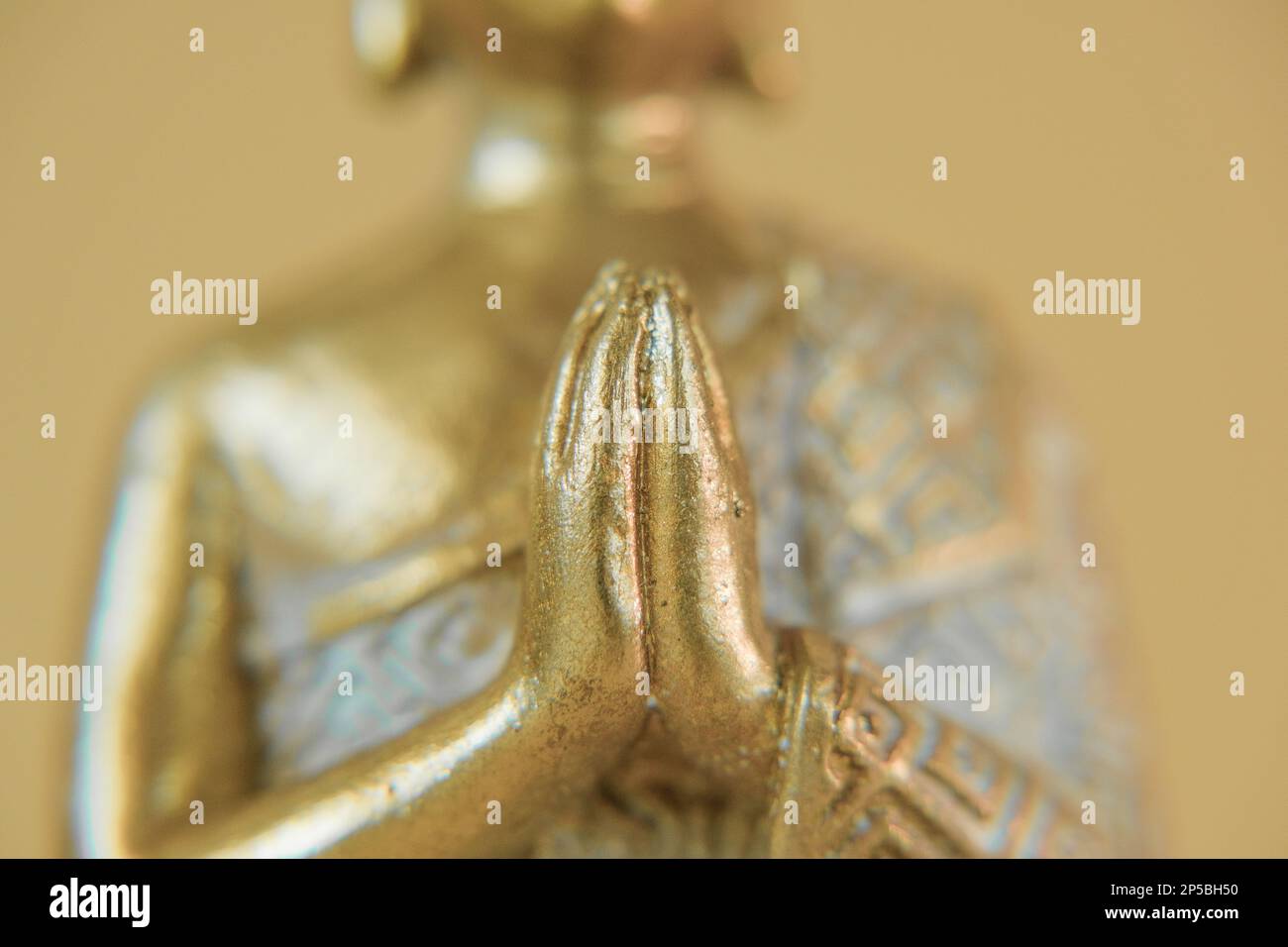 Buddha Hands close -up on beige background.Beautiful meditation and ...