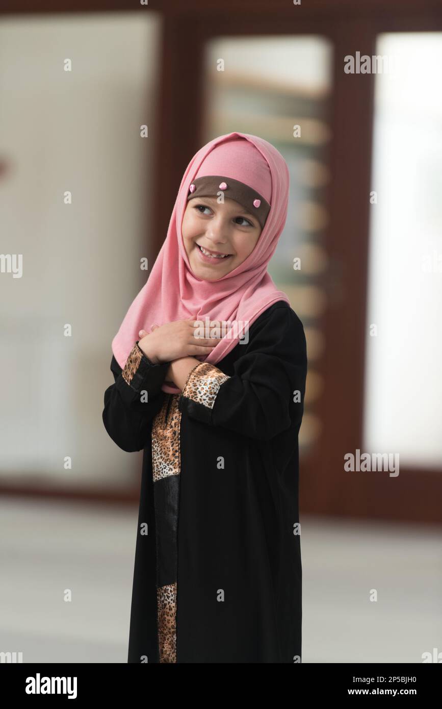 Portrait of a Young Muslim Girl Making Traditional Prayer To God Allah ...